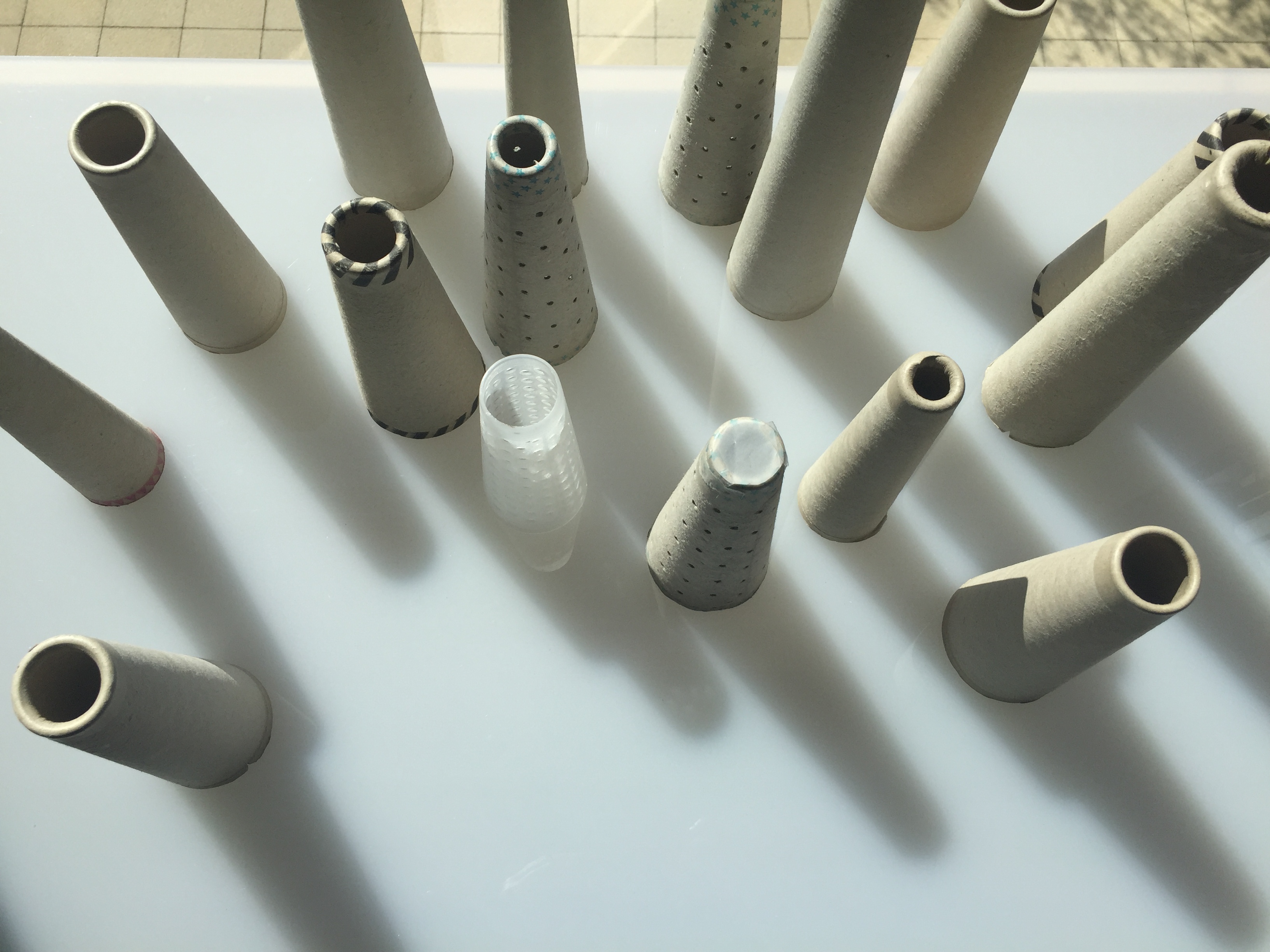 Silk cone shadows back projected | architectural moving drawing